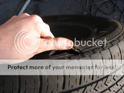 Broken Coil Spring Slashes Tire | Taurus Car Club of America : Ford ...